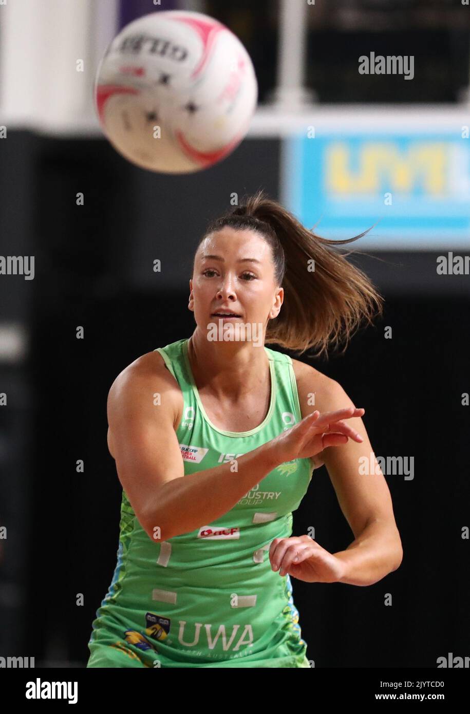 Verity Charles of the Fever warms up during the Round 13 Super Netball ...