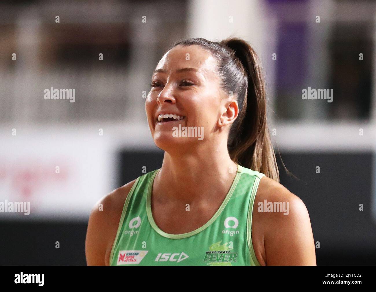 Verity Charles of the Fever warms up during the Round 13 Super Netball ...