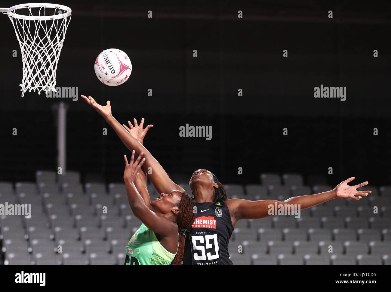 Shimona Nelson of the Magpies in action with Sunday Aryang of the Fever ...