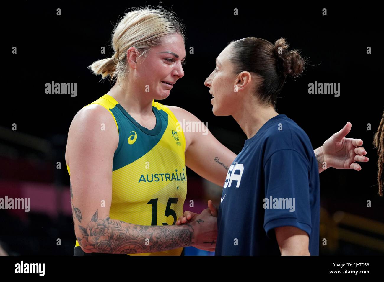 Cayla George of Australia and Diana Taurasi of the USA embrace ...