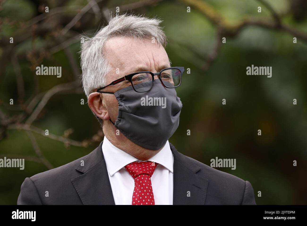 Victorian Health Minister Martin Foley looks on during a press ...