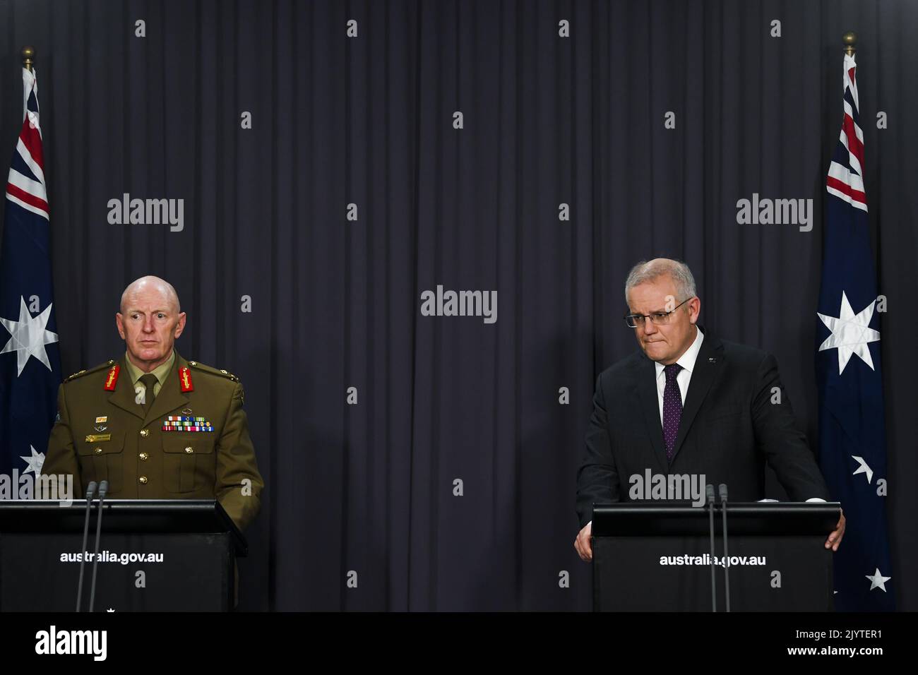 COVID-19 Taskforce Commander, Lieutenant General John Frewen (left) and ...