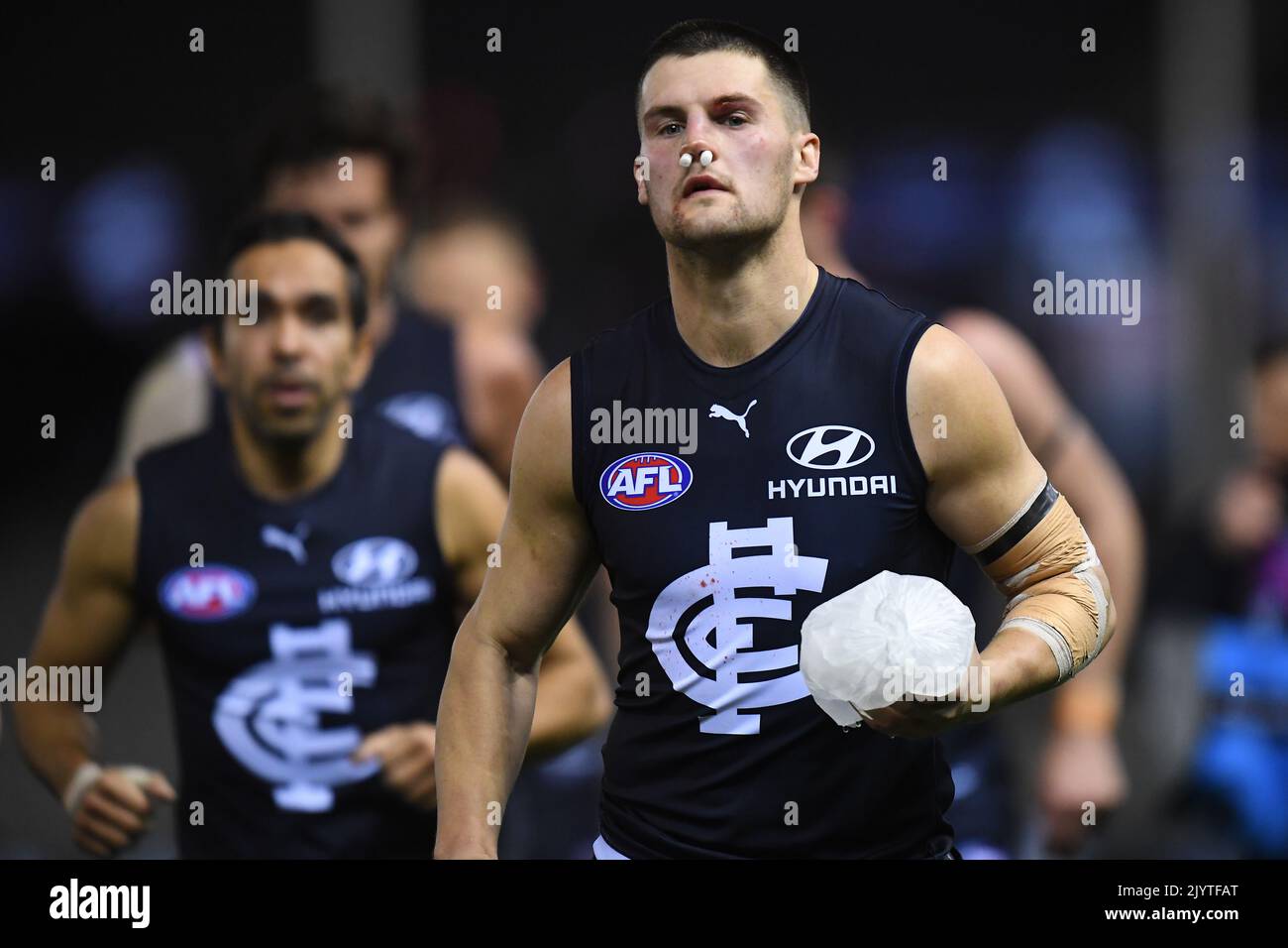 Nic Newman of Carlton Blues exits the field at half time during the AFL ...