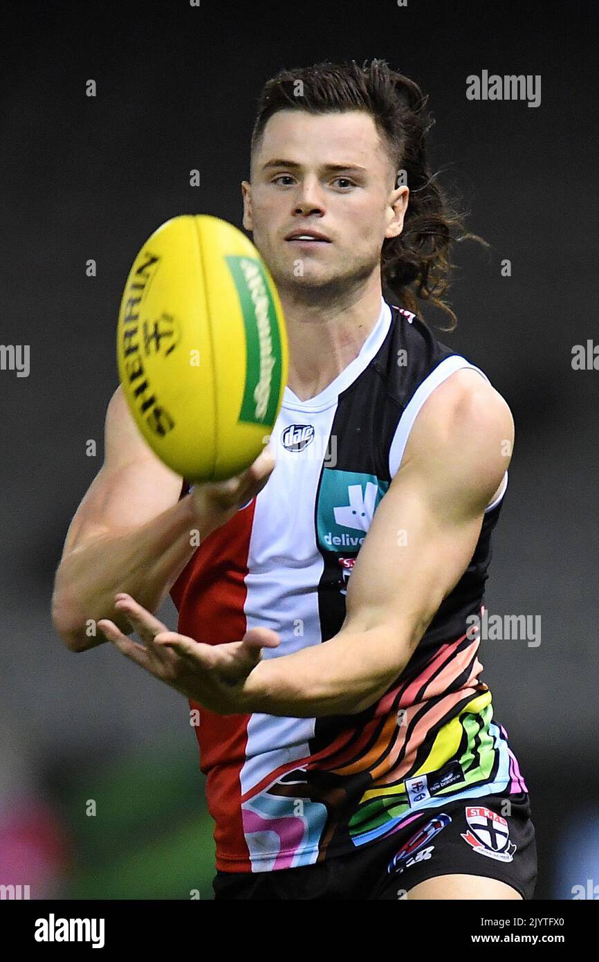 Jack Sinclair of St Kilda handballs the footy during the AFL Round 21 ...