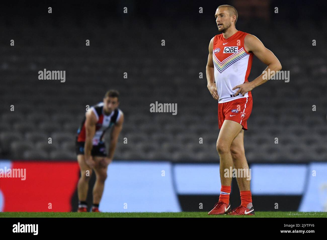 Sam Reid of the Swans (right) is seen after being defeated by the St ...