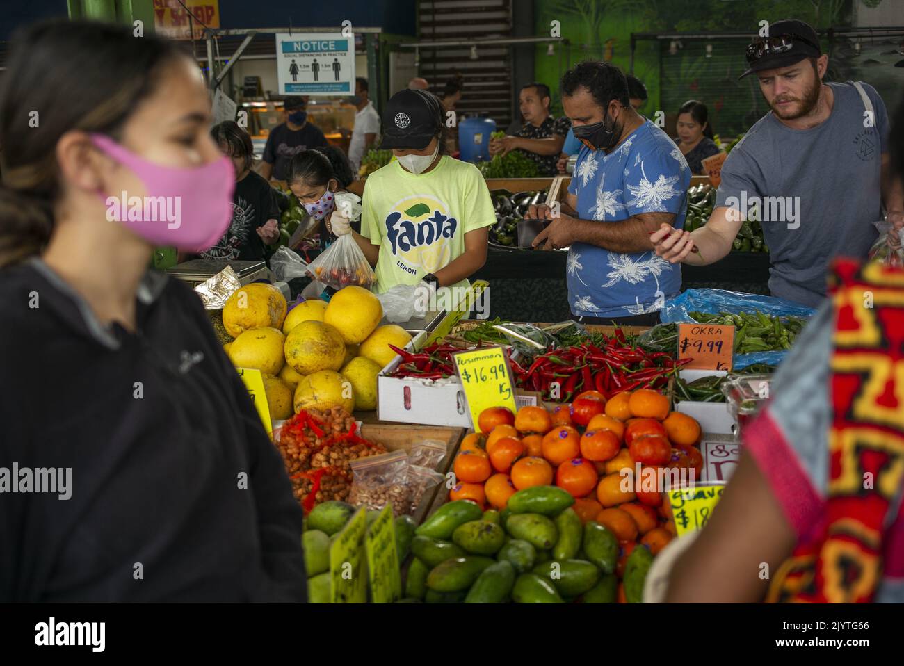 People shop for fresh produce at Rusty’s Markets in Cairns, Sunday ...