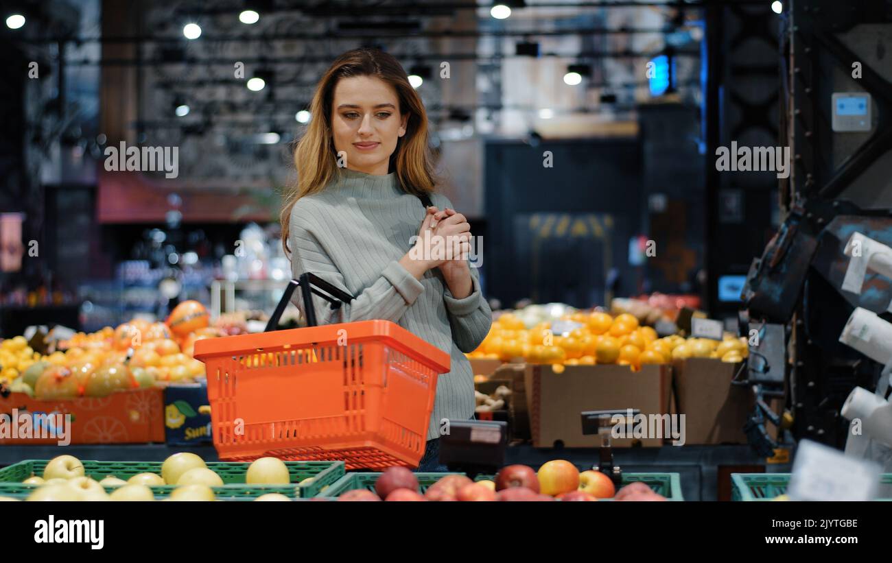Caucasian woman consumer female shopper girl buyer with shopping basket ...