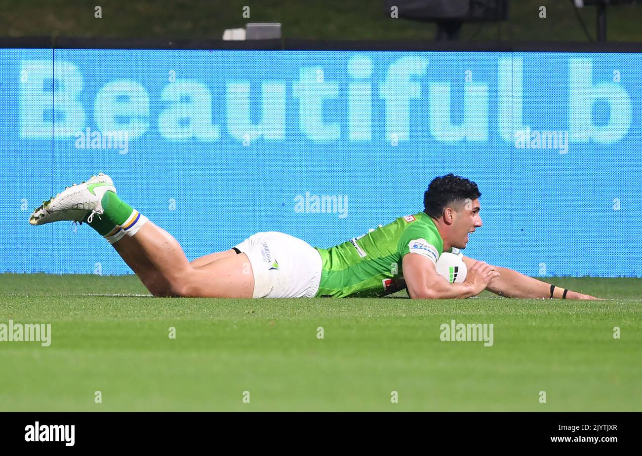Bailey Simonsson of the Raiders scores a try during the Round 22 NRL ...