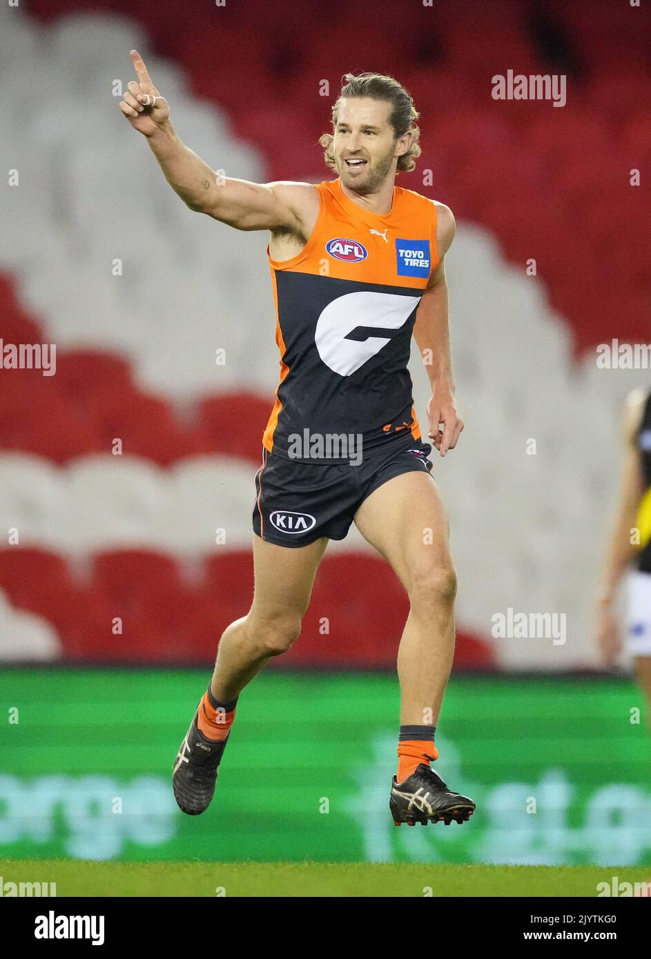 Callan Ward of the Giants celebrates after kicking a goal during the ...