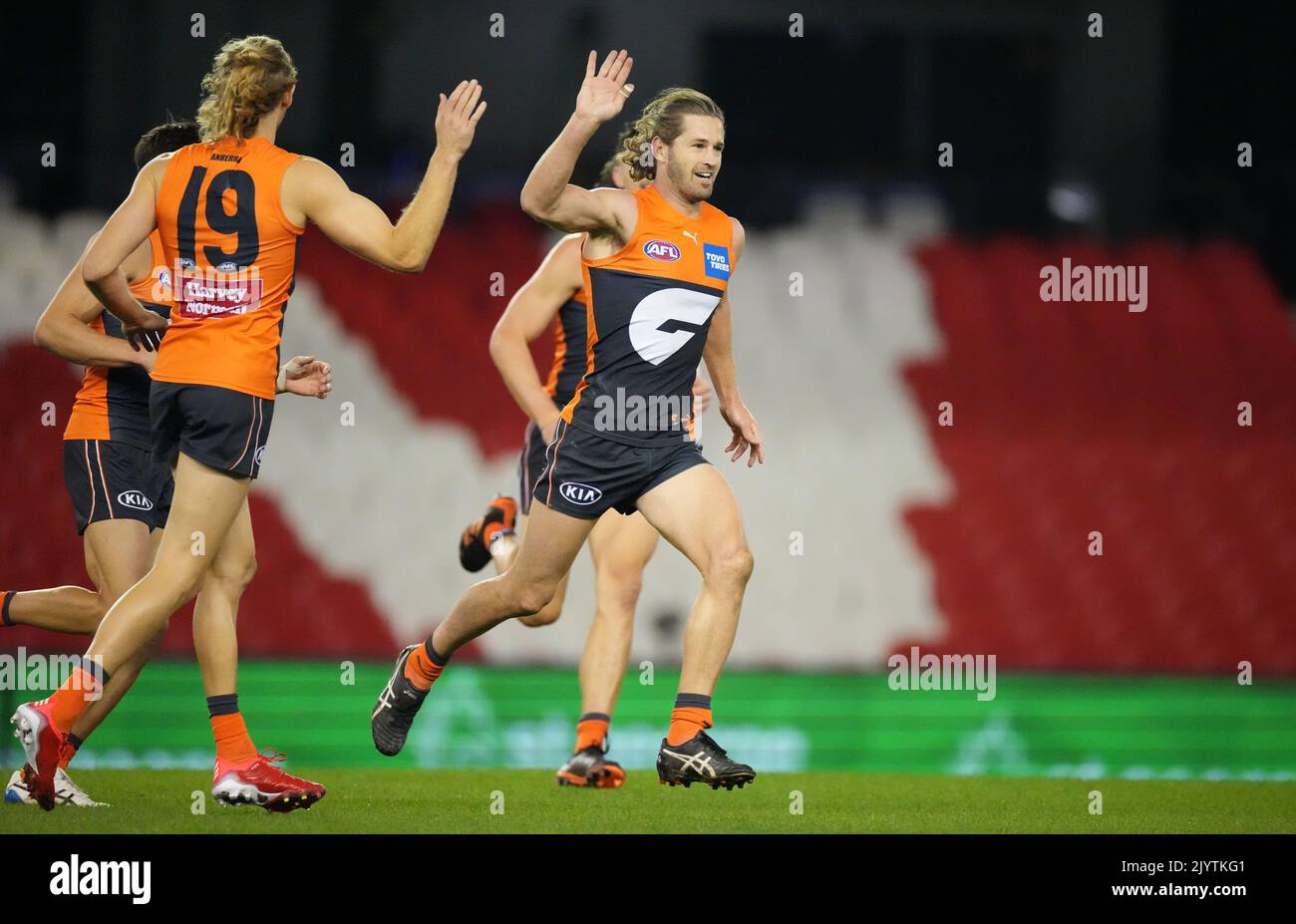Callan Ward of the Giants celebrates after kicking a goal during the ...