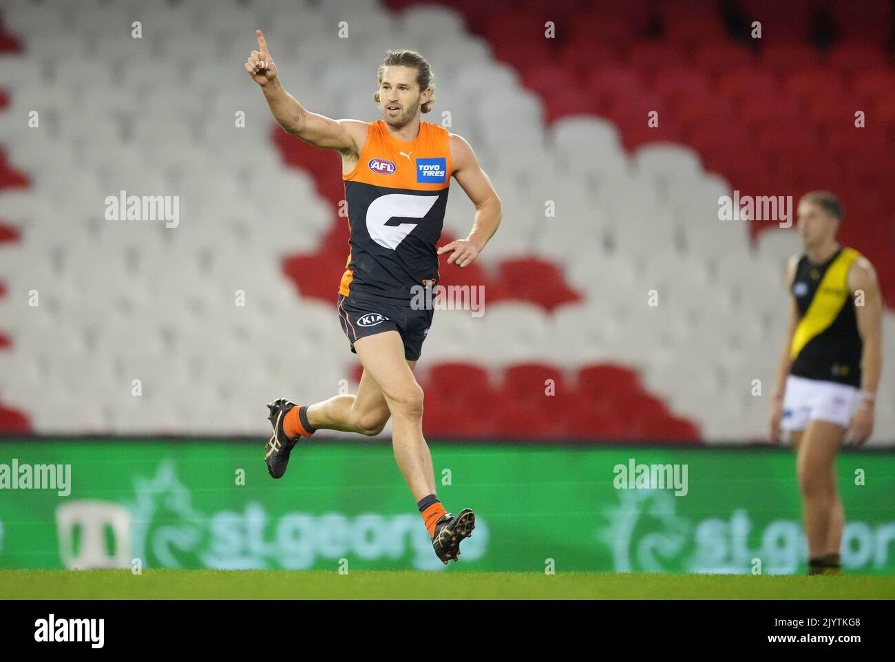 Callan Ward of the Giants celebrates after kicking a goal during the ...