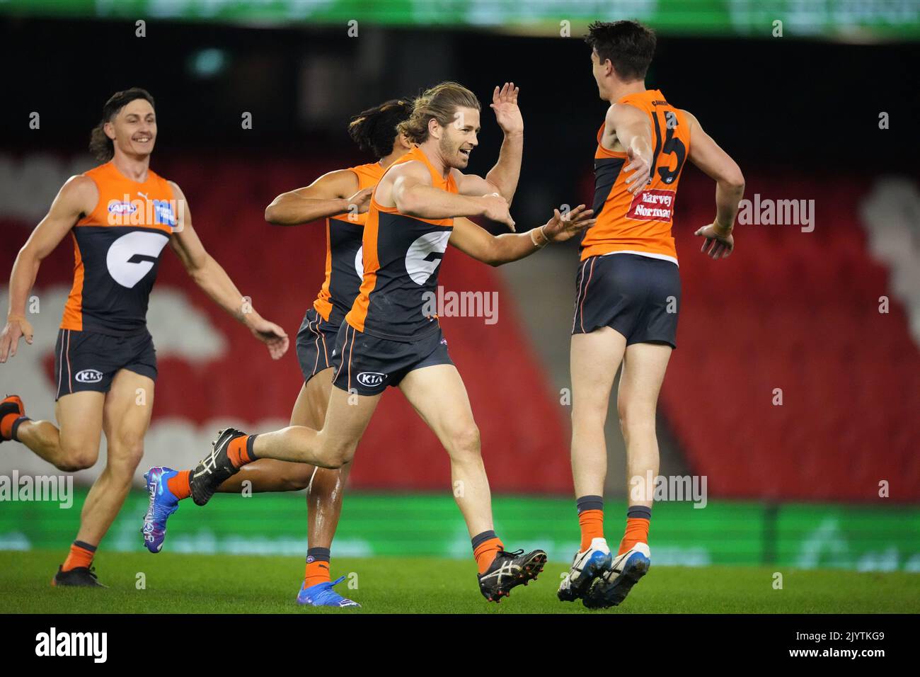 Callan Ward of the Giants celebrates after kicking a goal during the ...