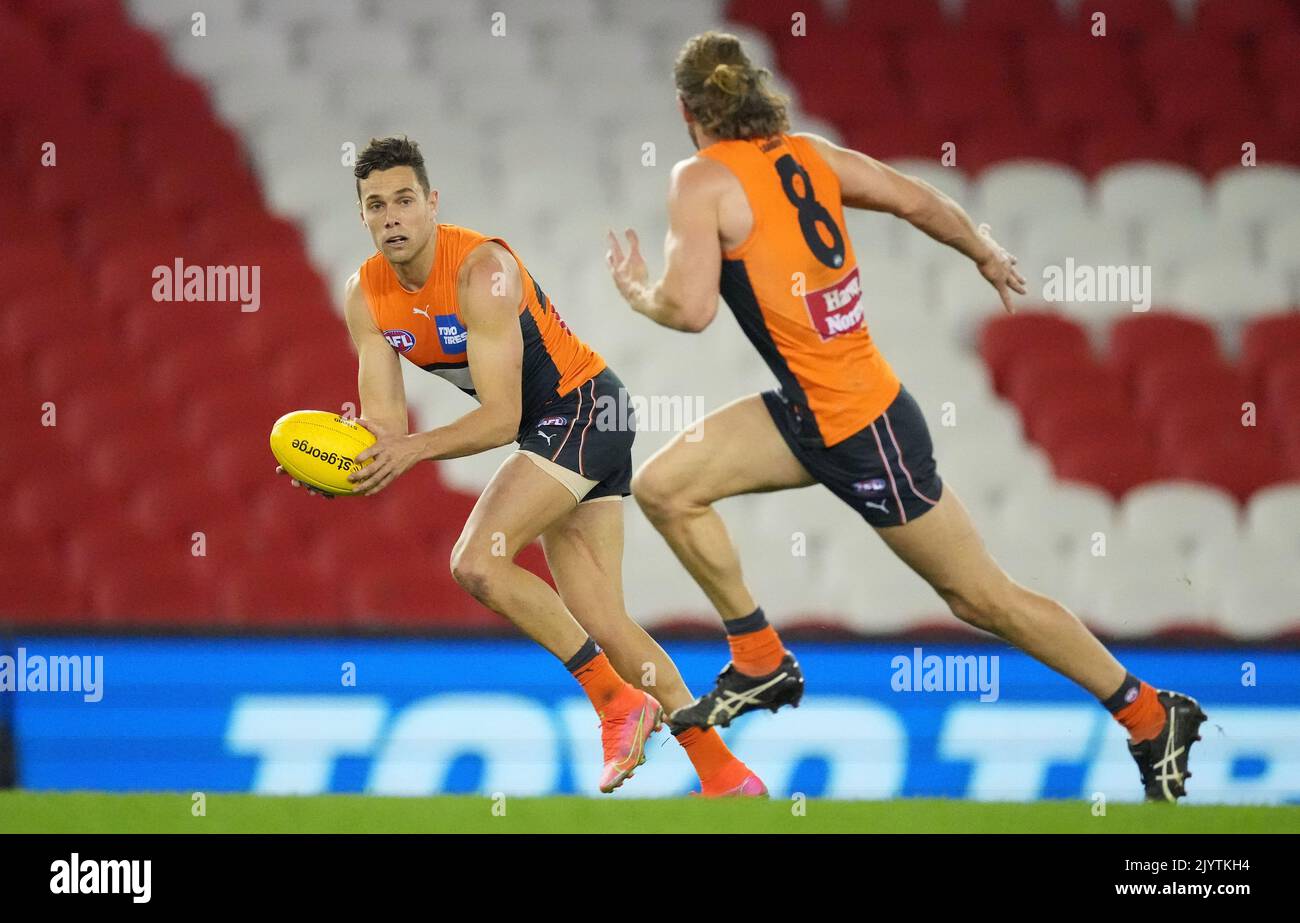 Josh Kelly of the Giants runs with the ball during the Round 22 AFL ...