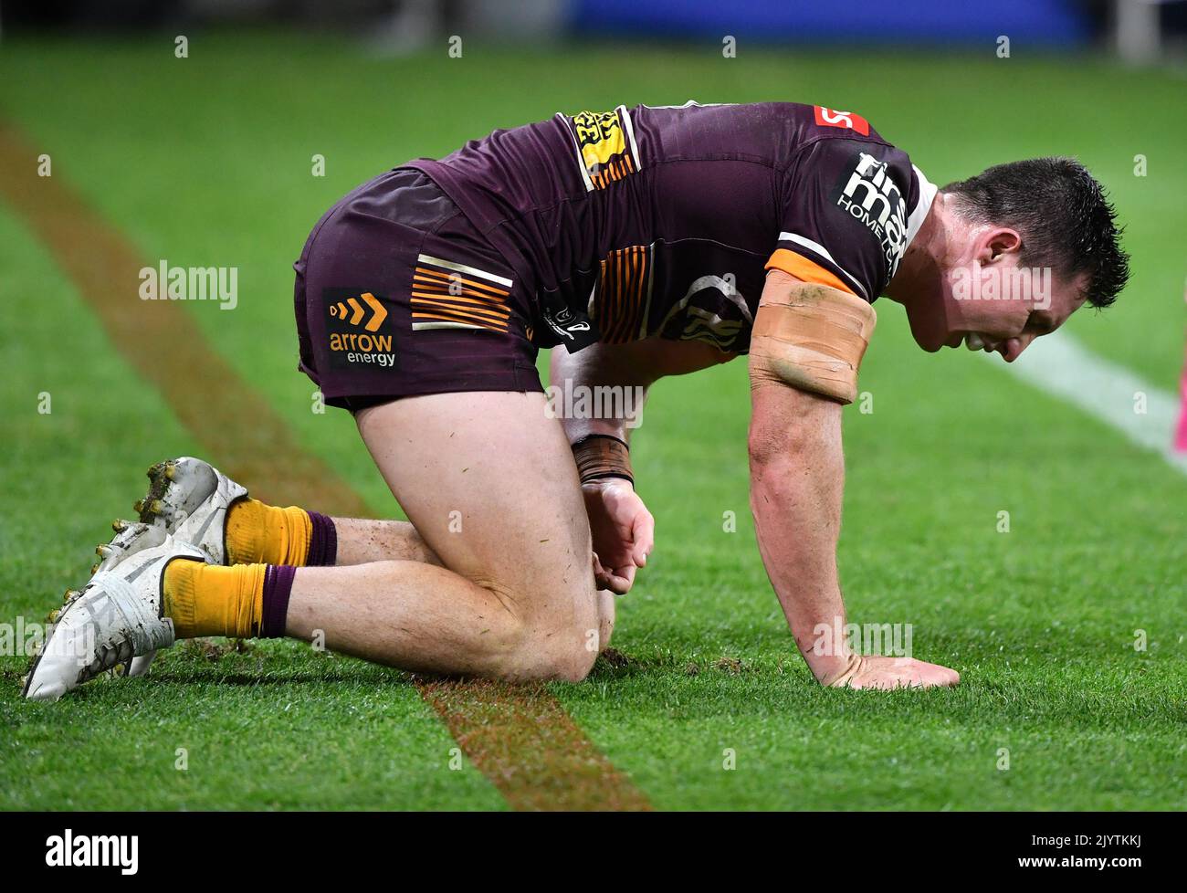 Tyson Gamble of the Broncos is seen reacting after injuring his hand ...