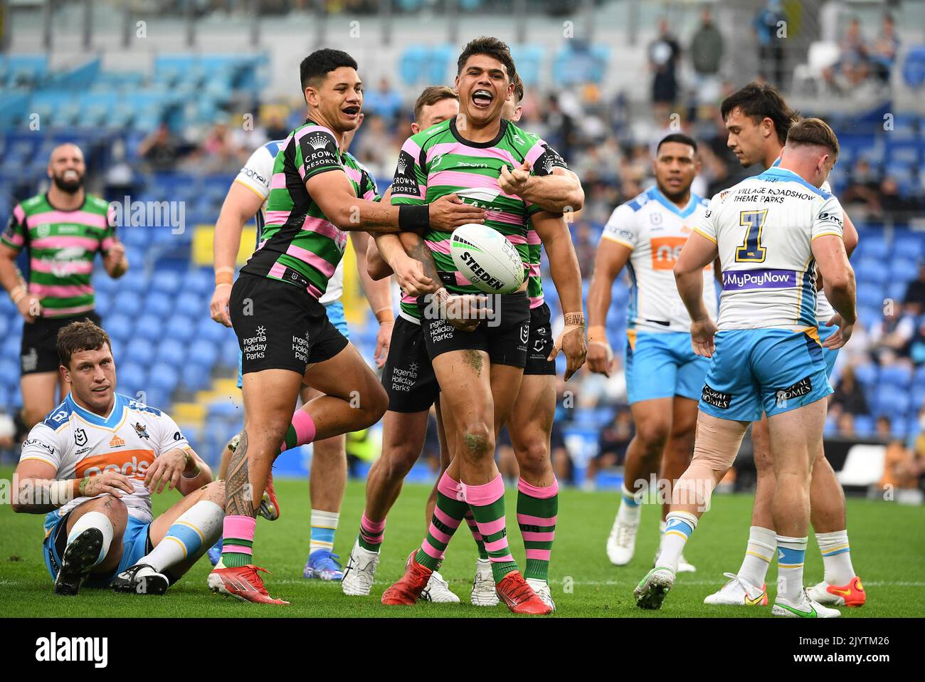 Latrell Mitchell of the Rabbitohs reacts after scoring a try during the ...