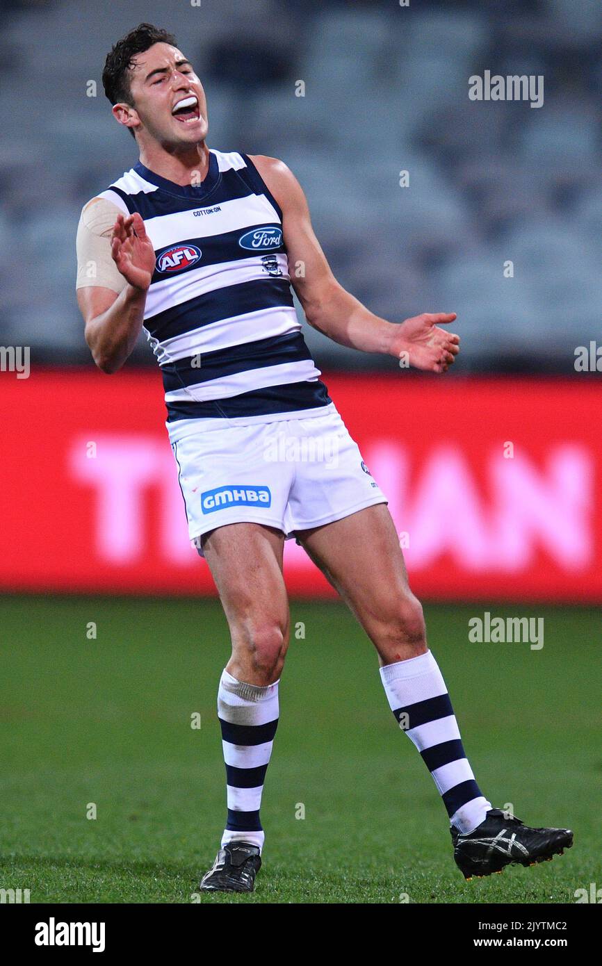 Sam Simpson of Geelong reacts after kicking a goal during the AFL Round ...