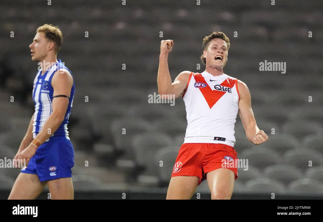 Hayden McLean of the Swans celebrates after kicking a goal during the ...
