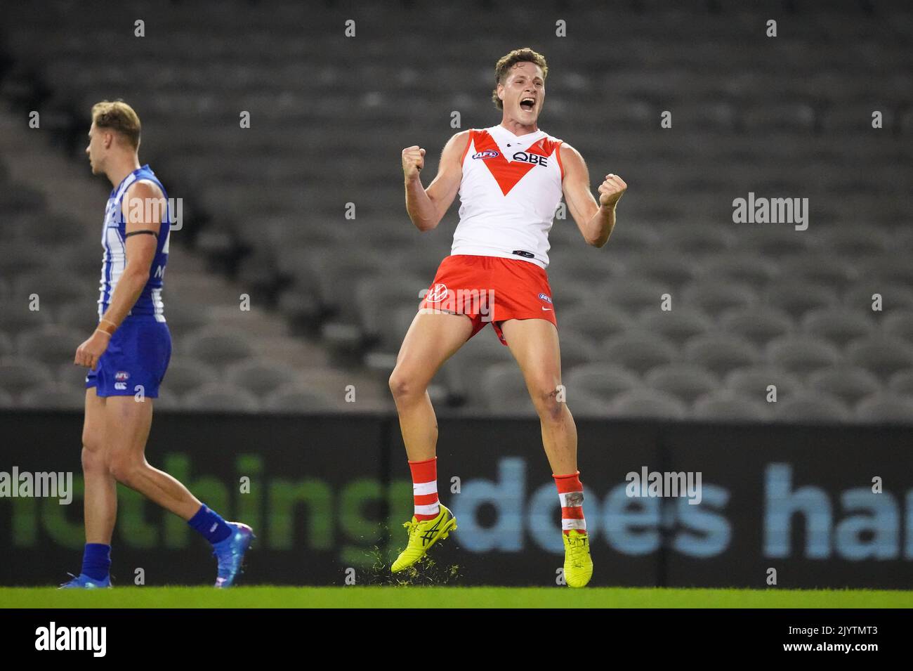 Hayden McLean of the Swans celebrates after kicking a goal during the ...