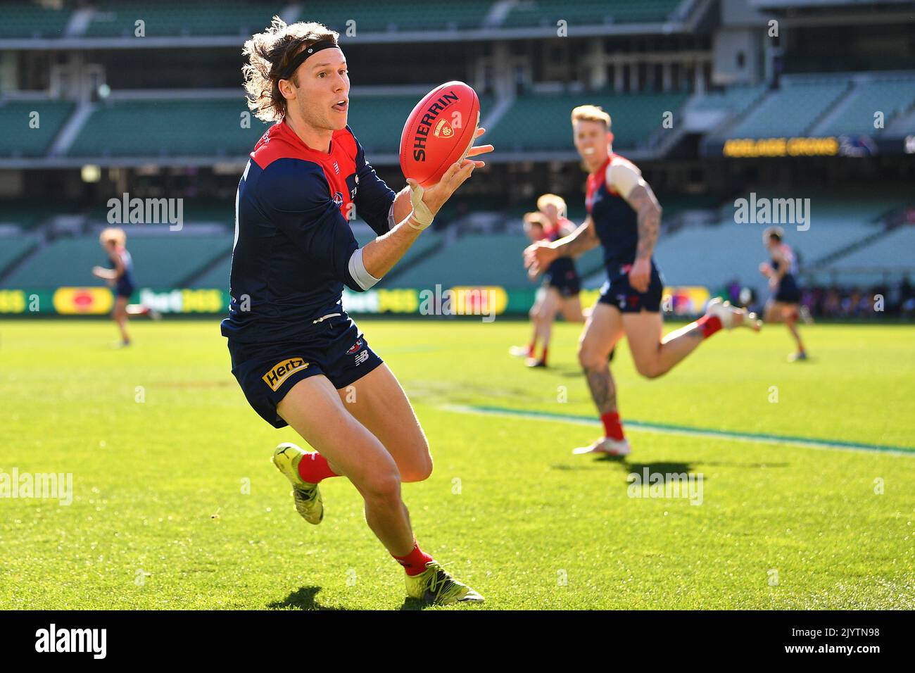 Ed Langdon of the Demons marks the footy during the AFL Round 22 match ...