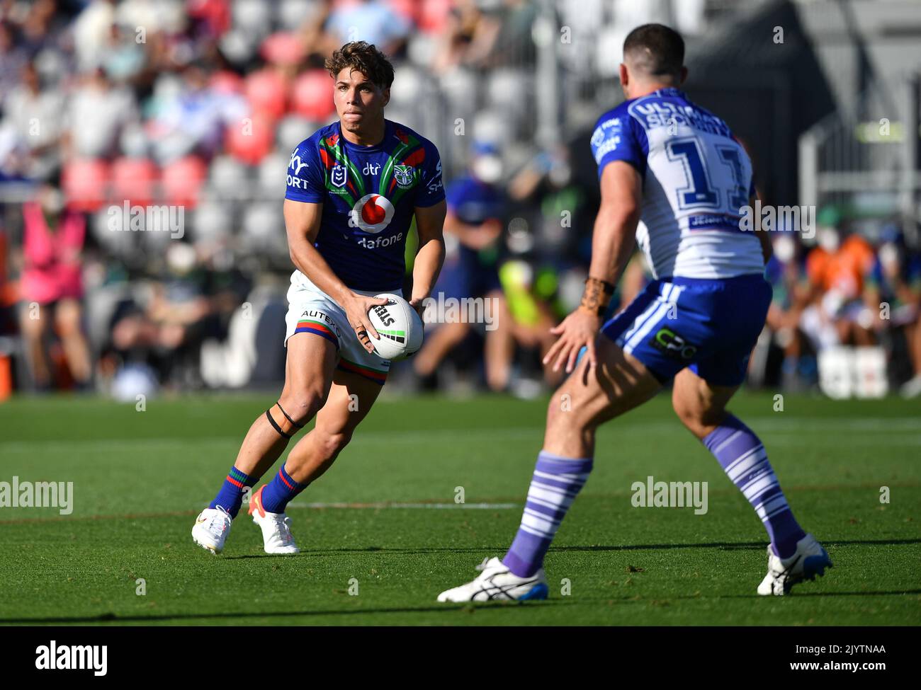 Reece Walsh (left) of the Warriors in action during the NRL Round 22 ...