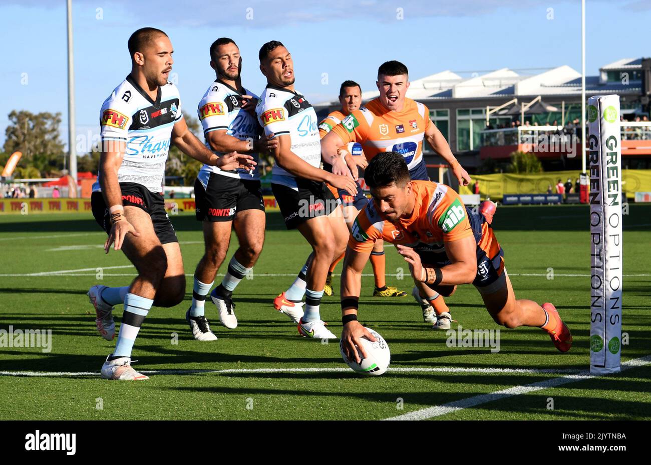 Enari Tuala (right) of the Knights scores a try during the NRL Round 22 ...