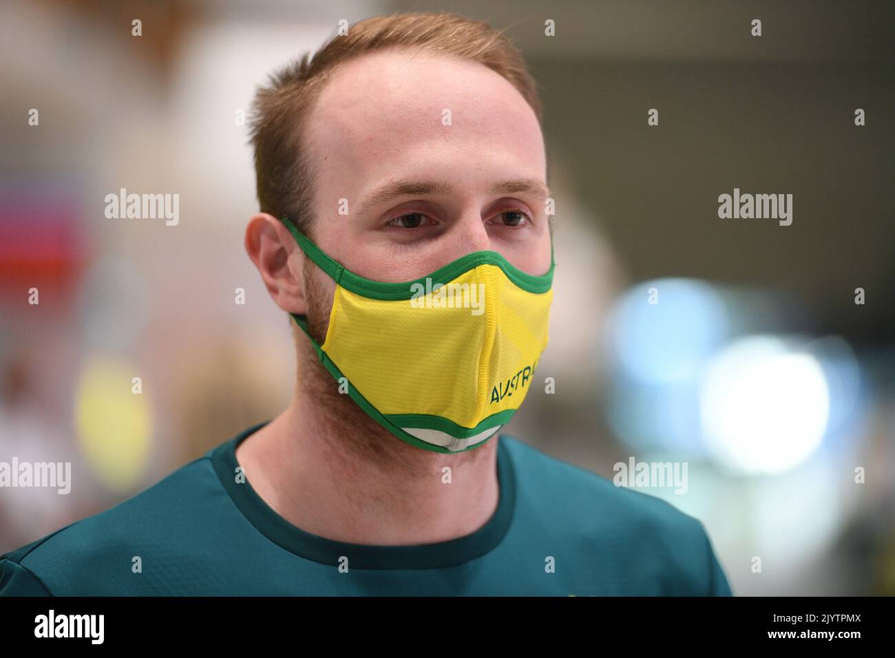 Australian Olympic swimmer Matthew WIlson speaks to media as he arrives ...
