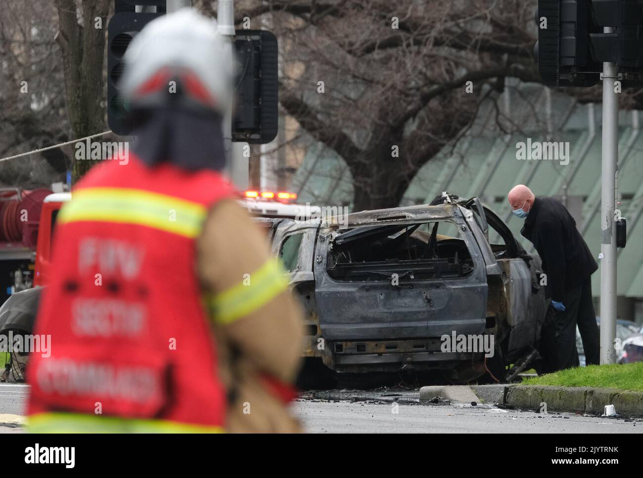 Police work at the scene of a fatal car fire in Melbourne, Friday ...