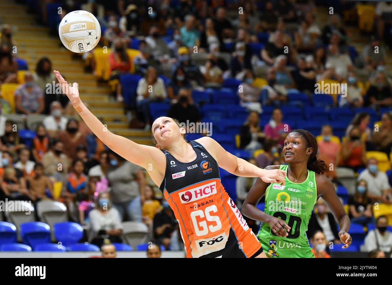 Jo Harten (left) of the Giants in action during the Super Netball ...