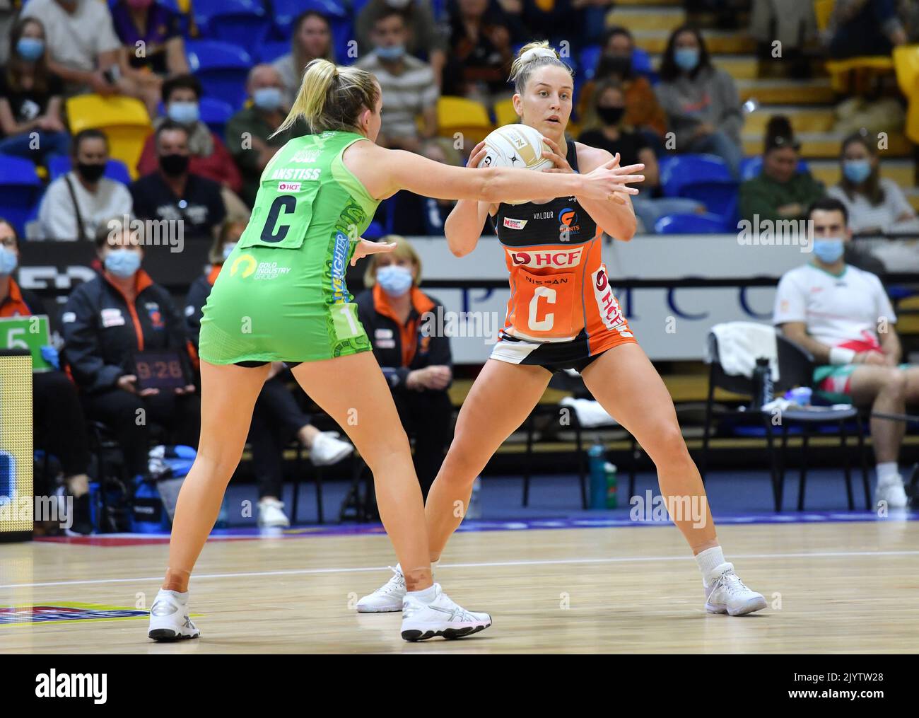 Jamie-Lee Price (right) of the Giants takes on Jess Anstiss of the ...