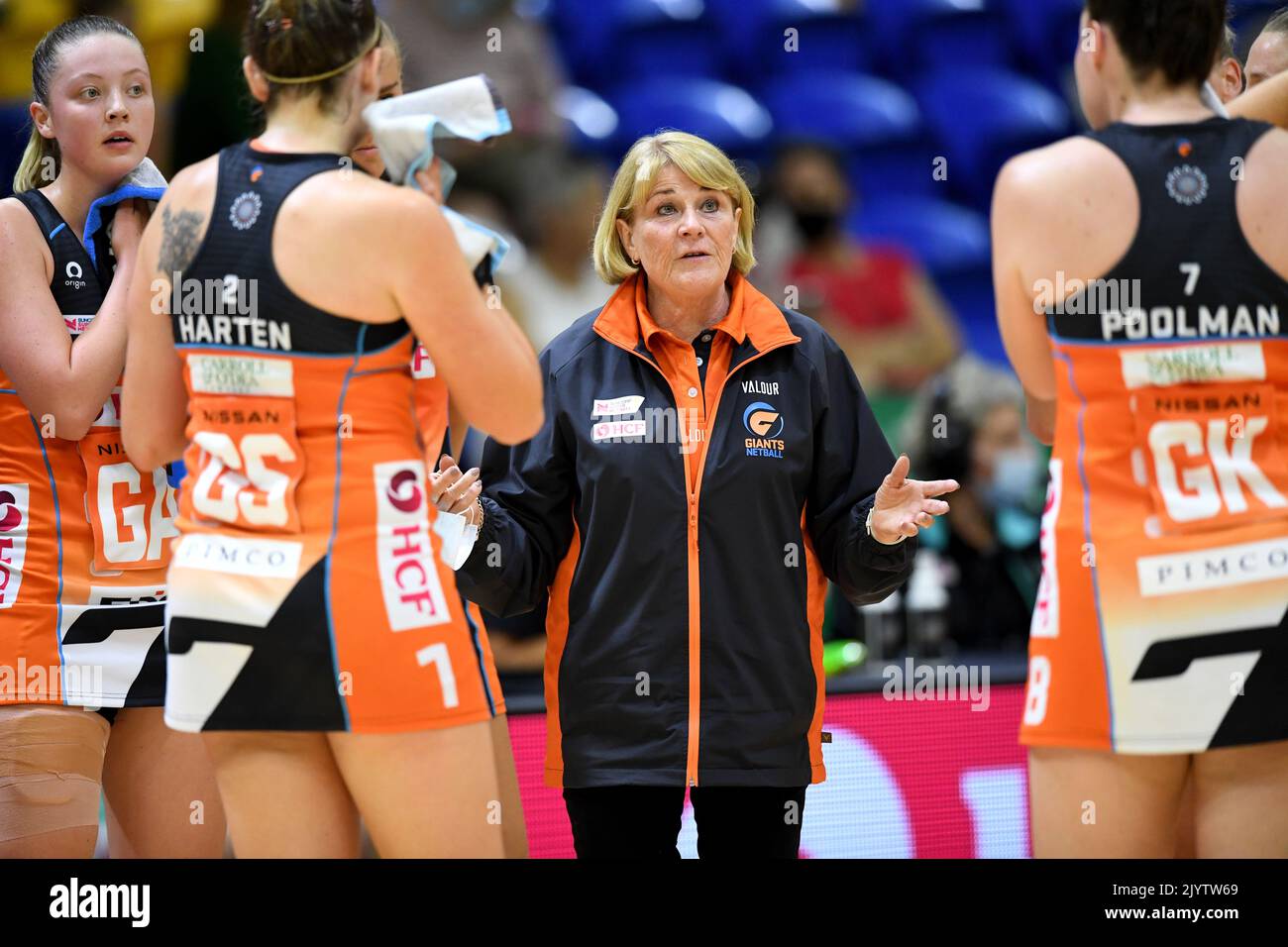 Giants coach Julie Fitzgerald (centre) is seen talking to her players ...