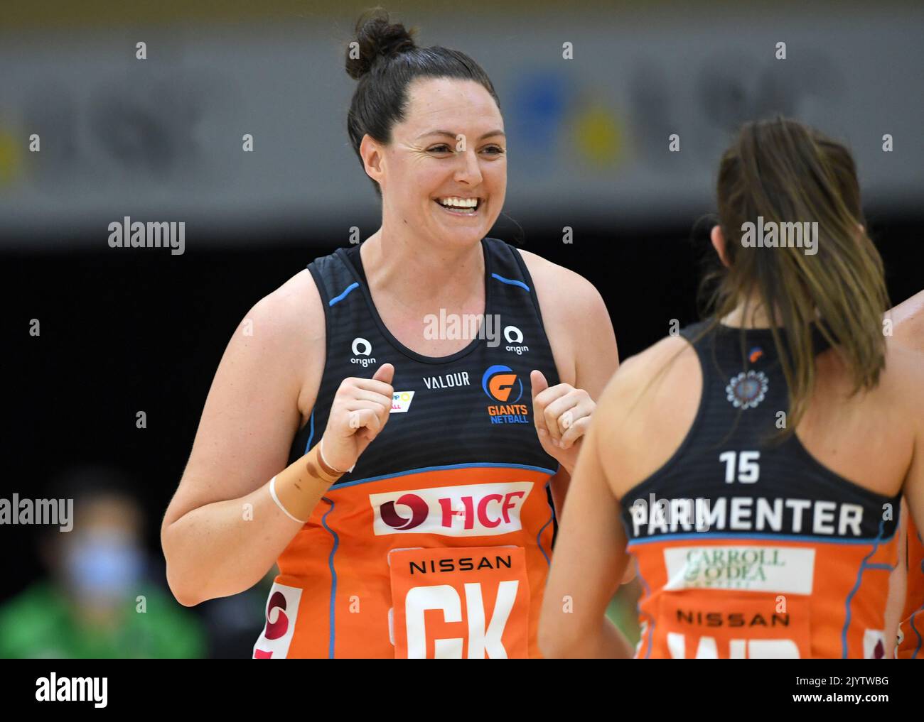 Sam Poolman (left) of the Giants celebrates during the Super Netball ...