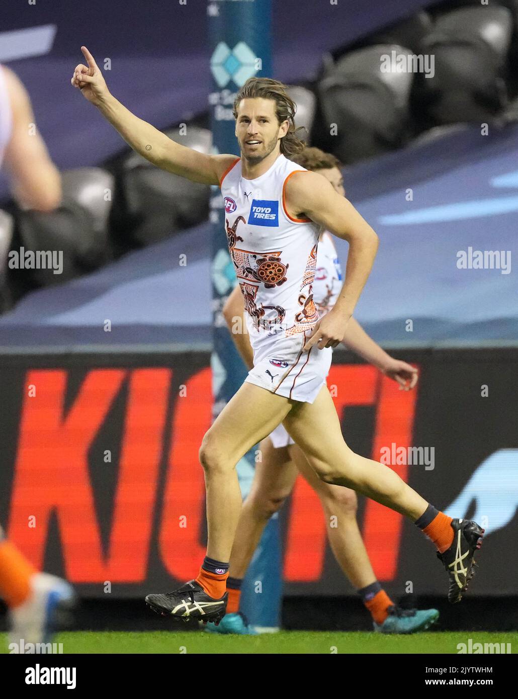 Callan Ward of the Giants celebrates after kicking a goal during the ...