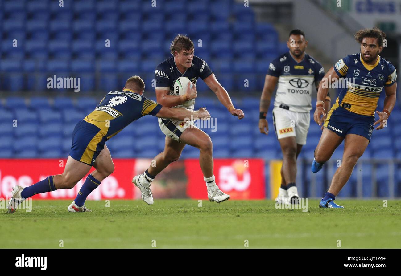 Joey Lussick (left) of Parramatta Eels try to stop Mitchell Dunn of ...