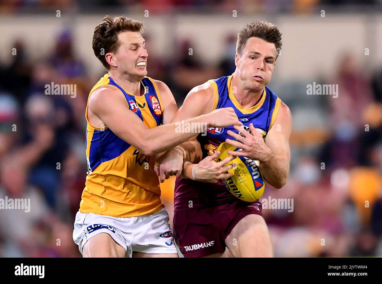 Alex Witherden of the Eagles (left) competes with Lincoln McCarthy of ...