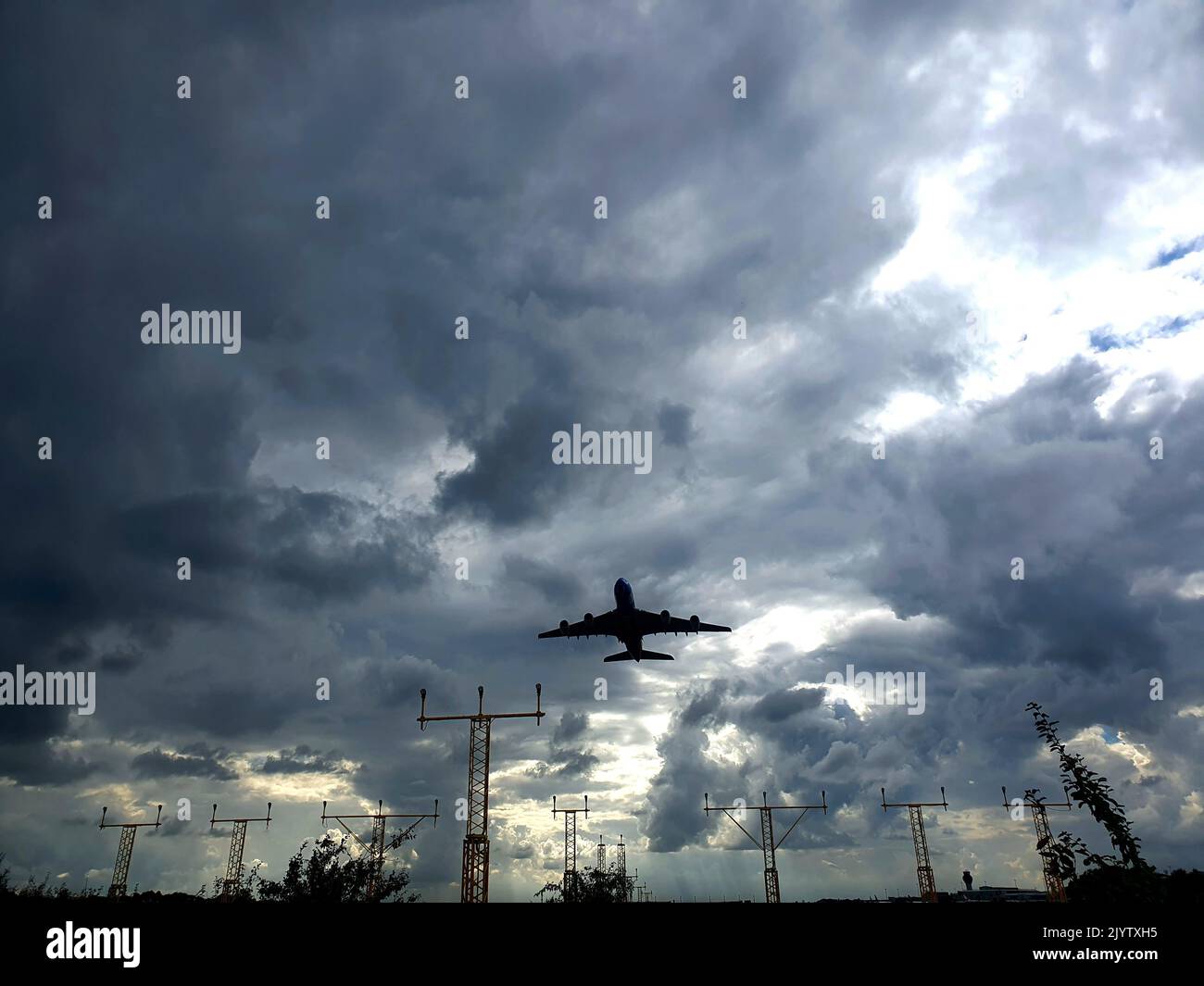 Passenger jet taking off at manchester airport Stock Photo - Alamy