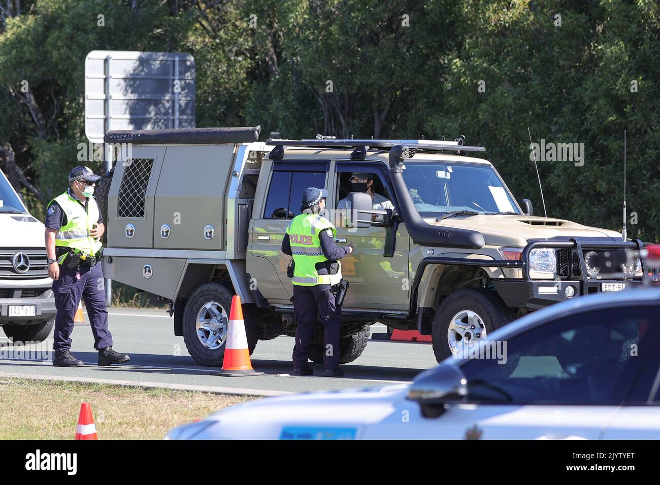 Australian Defence Force (ADF) personnel and Queensland Police process ...