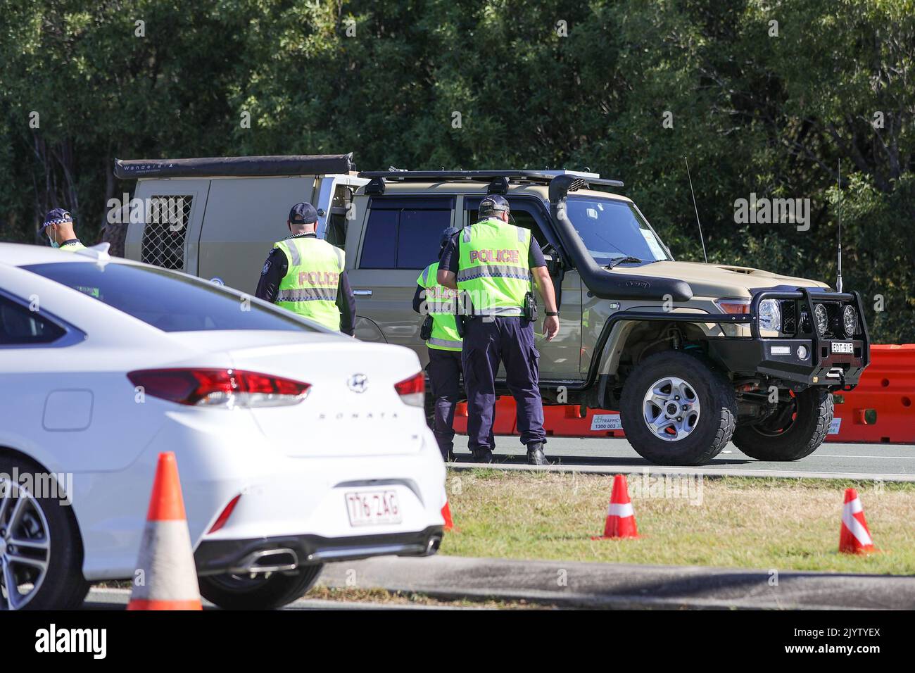 Australian Defence Force (ADF) personnel and Queensland Police process ...