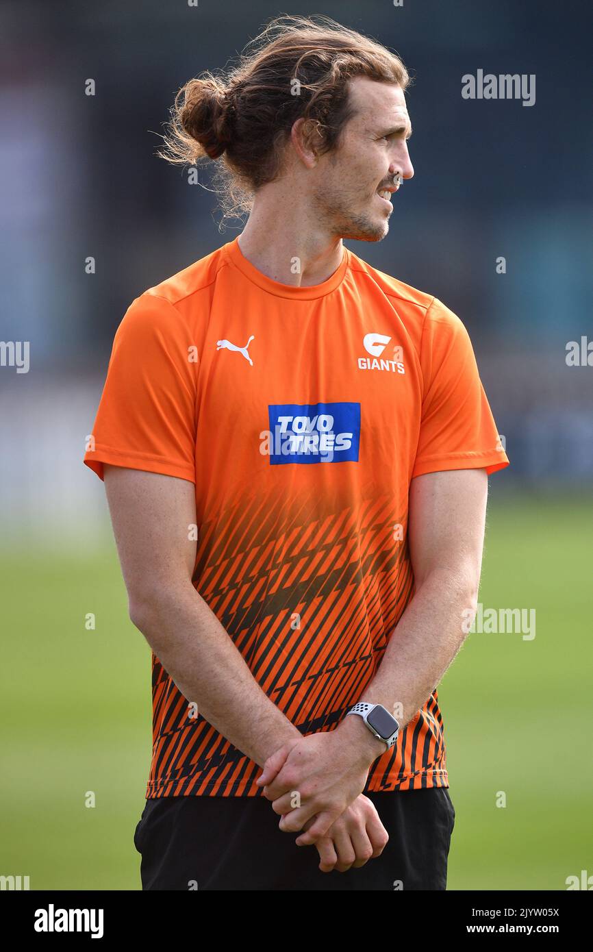 Phil Davis of the Giants looks on during a GWS Giants AFL training ...