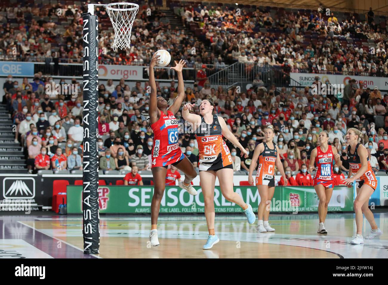 Sam Wallace of the Swifts catches the ball during the Super Netball ...