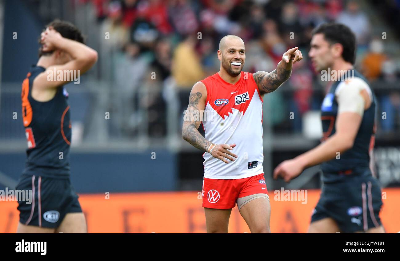 Lance Franklin (centre) of the Swans celebrates kicking a goal during ...