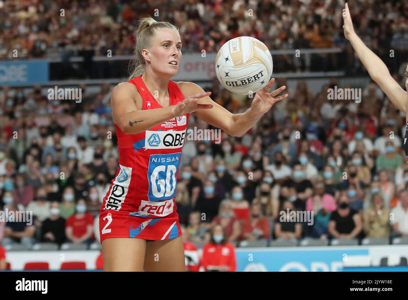 Maddy Turner of the Swifts passes the ball during the Super Netball ...