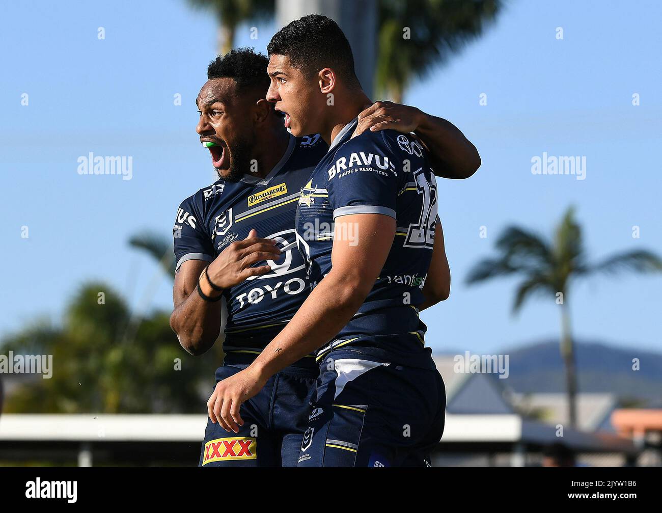 Hamiso Tabuai-Fidow (left) reacts with try-scorer Heilum Luki (right ...