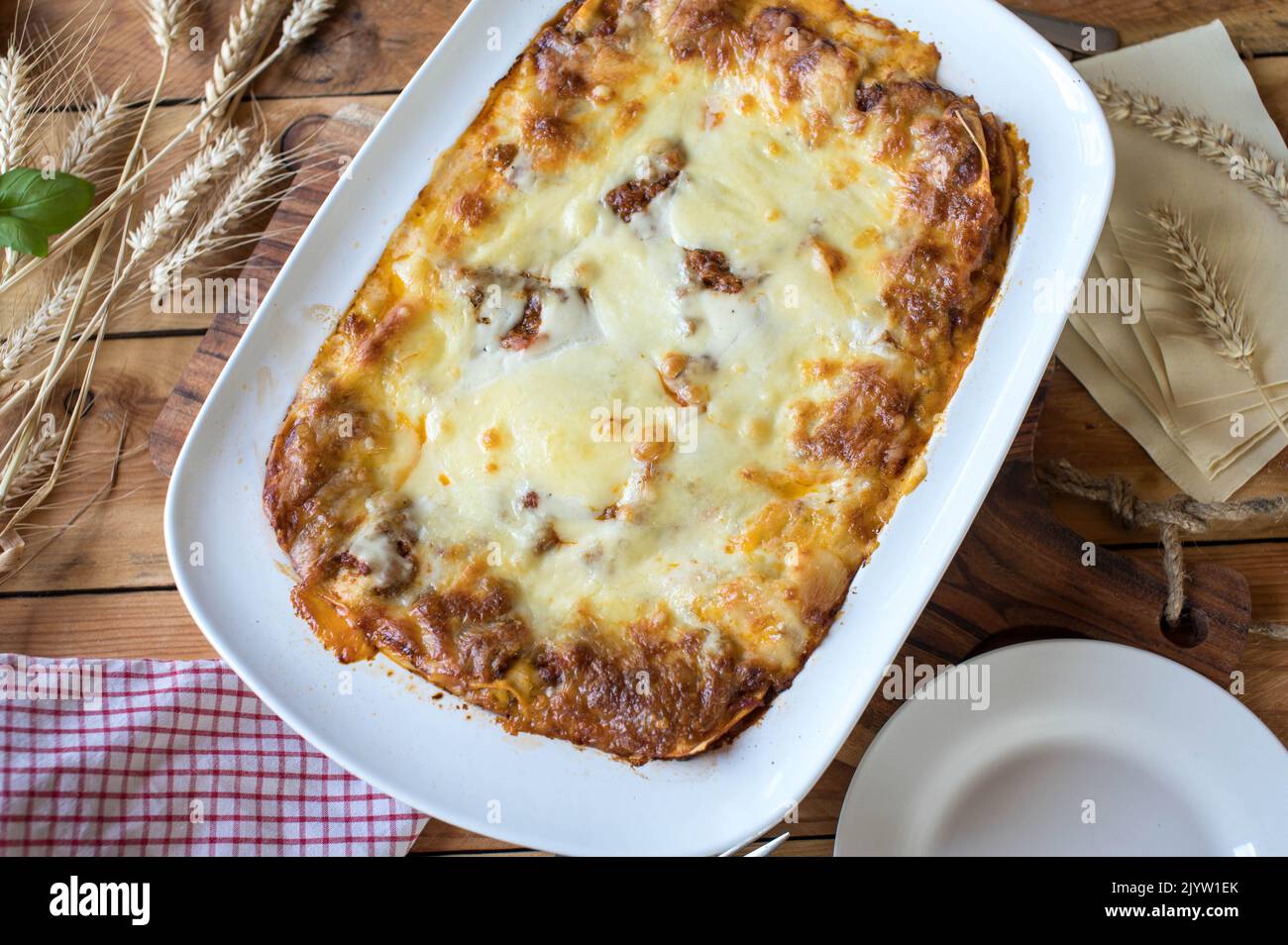 Lasagne with bolognese, bechamel sauce and mozzarella cheese topping in ...