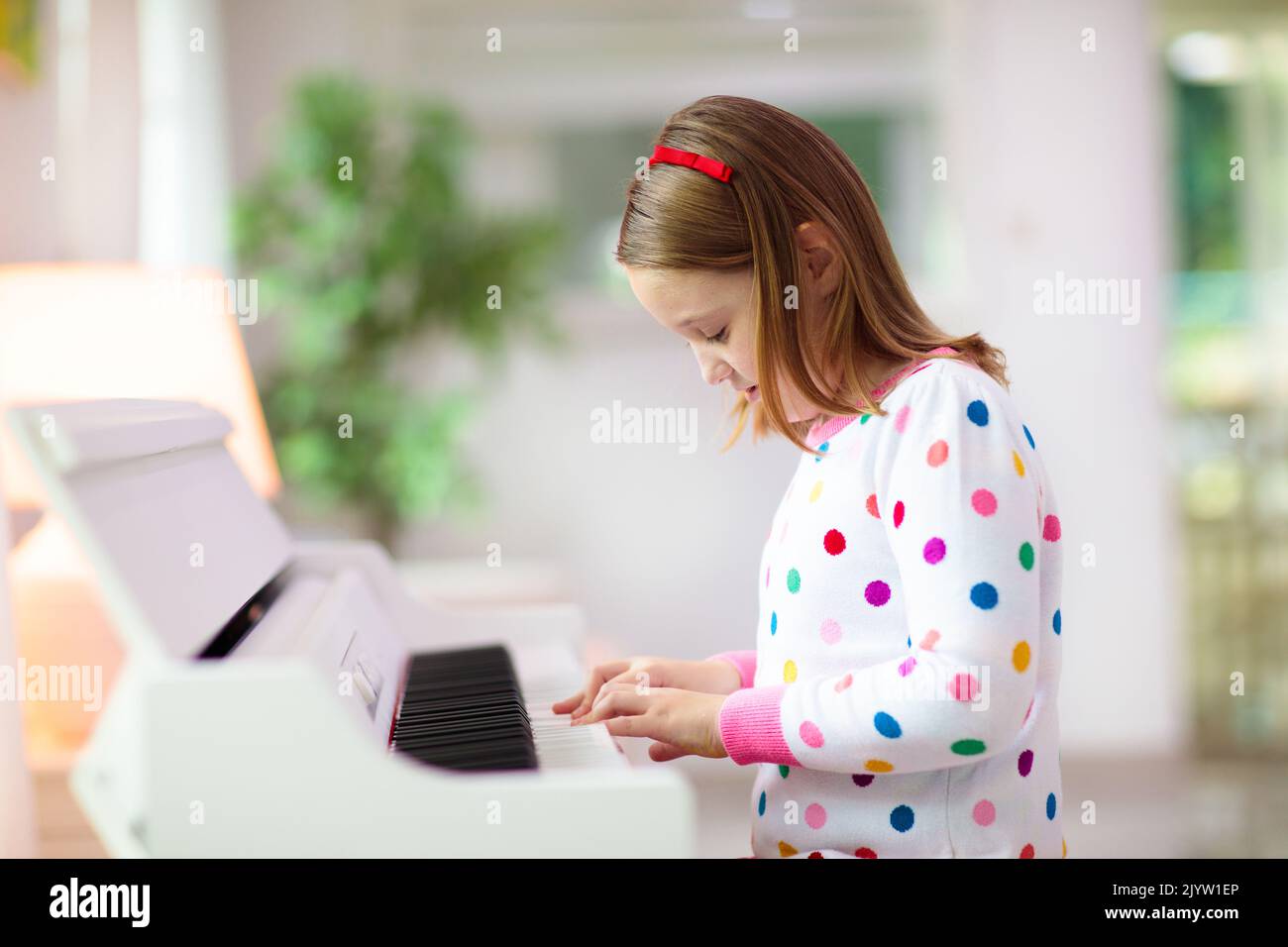 Child playing piano. Kids play music. Classical education for children ...