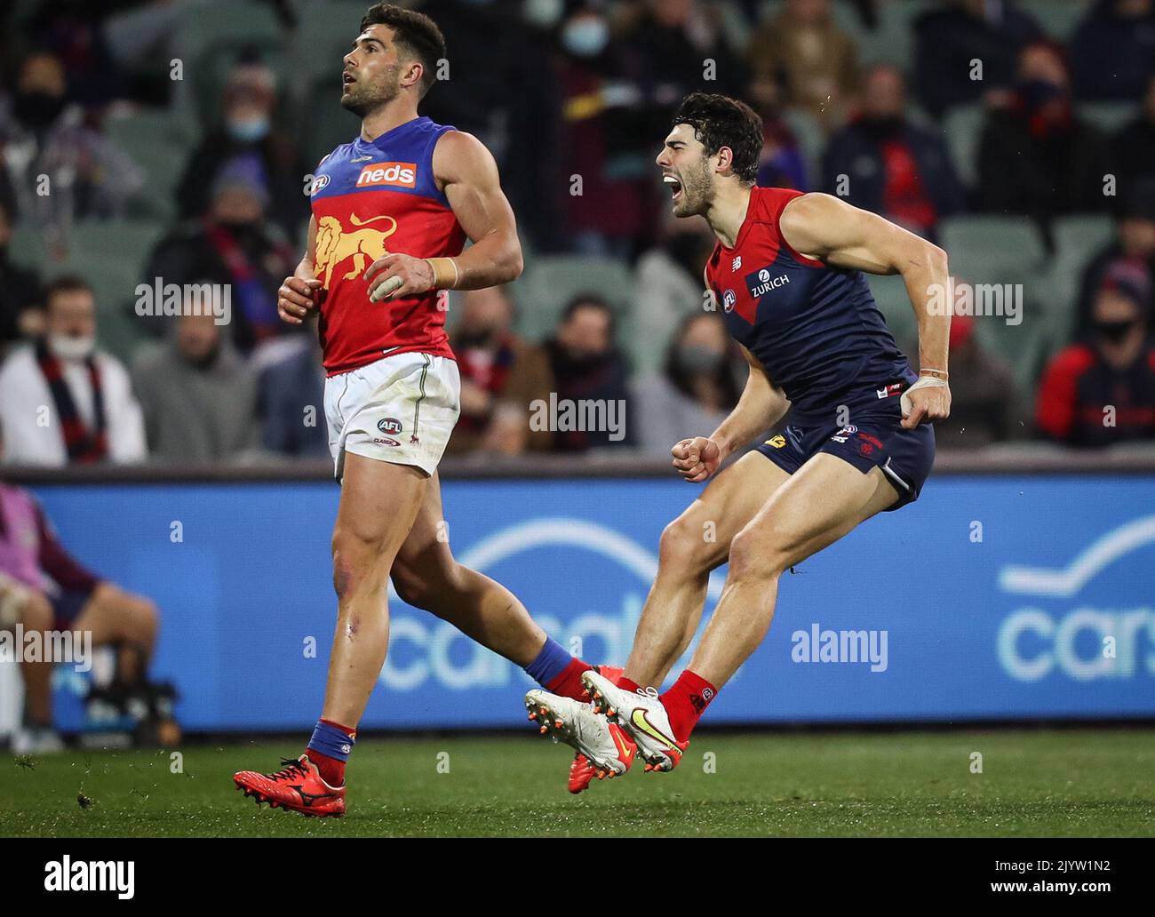 Christian Petracca of the Demons reacts after missing a goal as Marcus ...