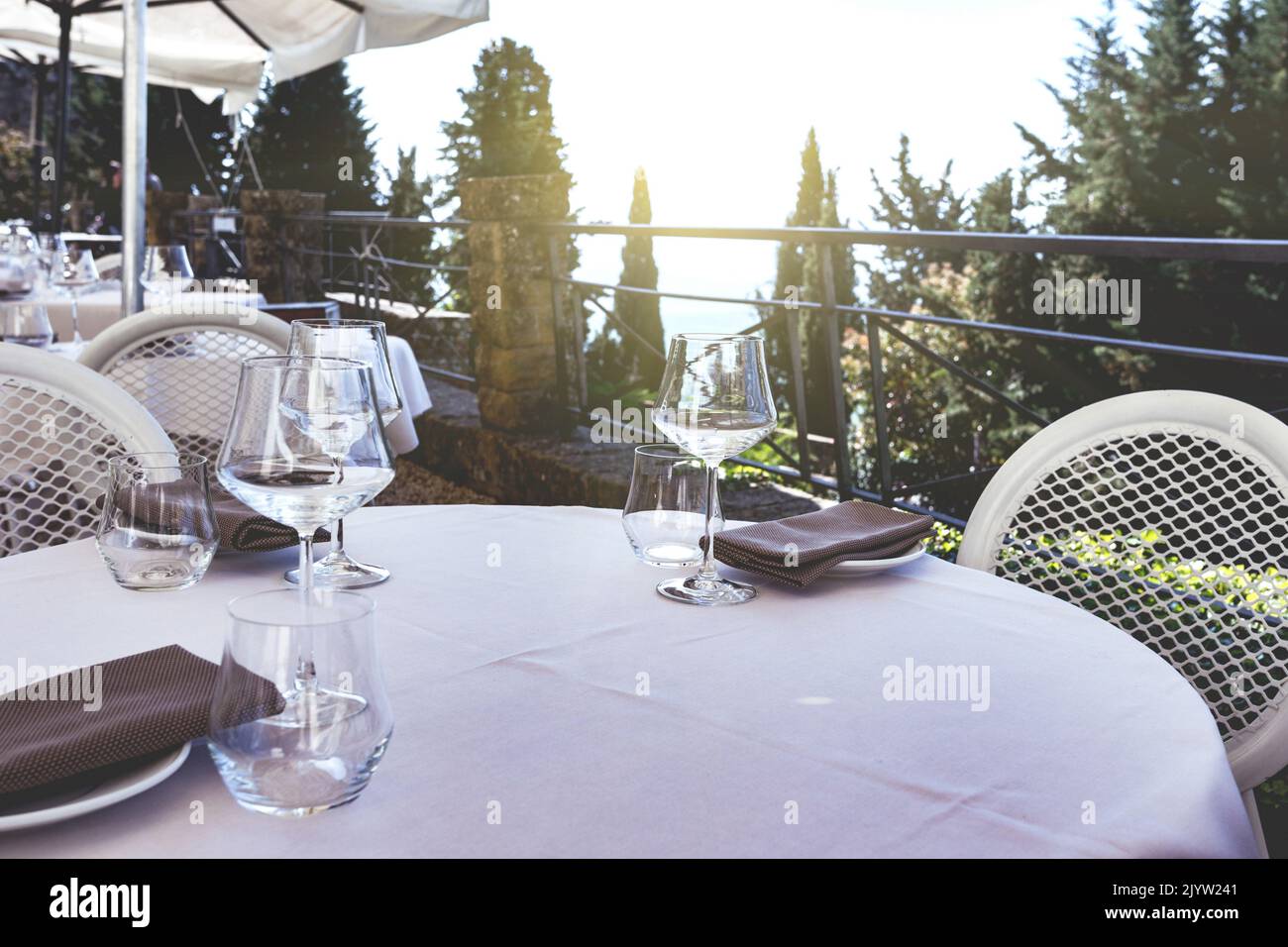 cafe. Served table in the background of the Tuscan landscape. Tuscany ...