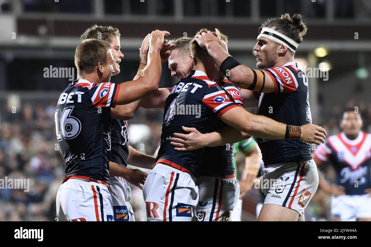 Ben Marschke (left) of the Roosters celebrates scoring a try with team ...
