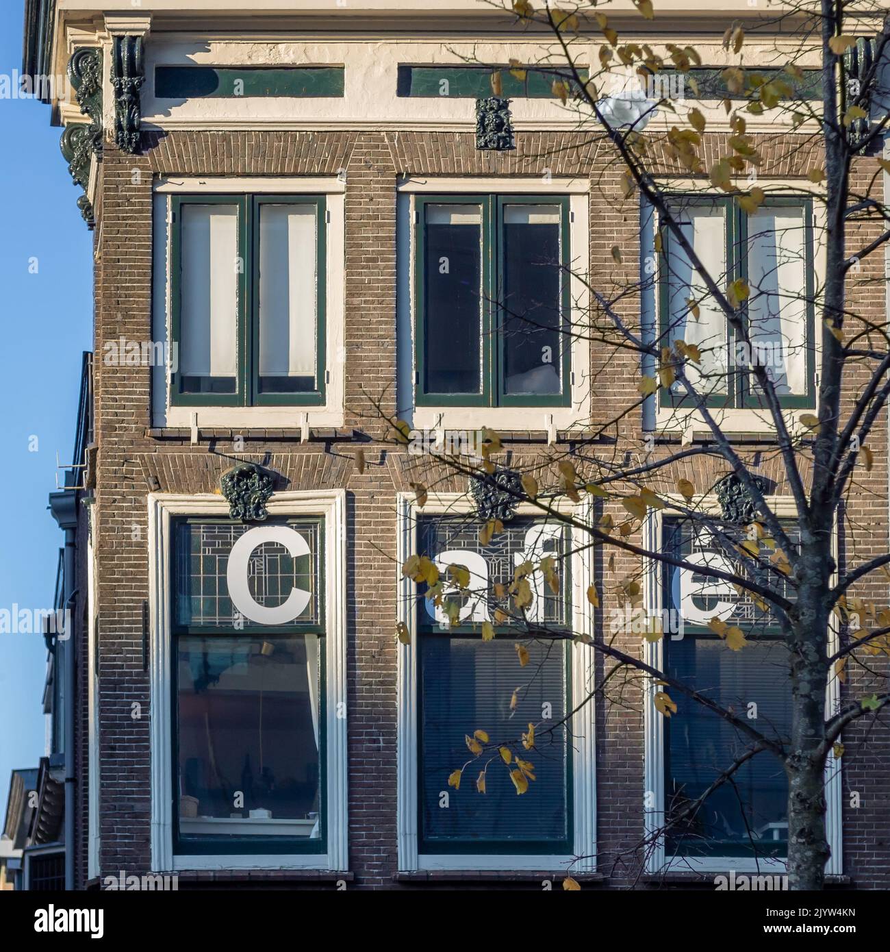 Historic facade of a cafe and residence in the city of Utrecht, the ...