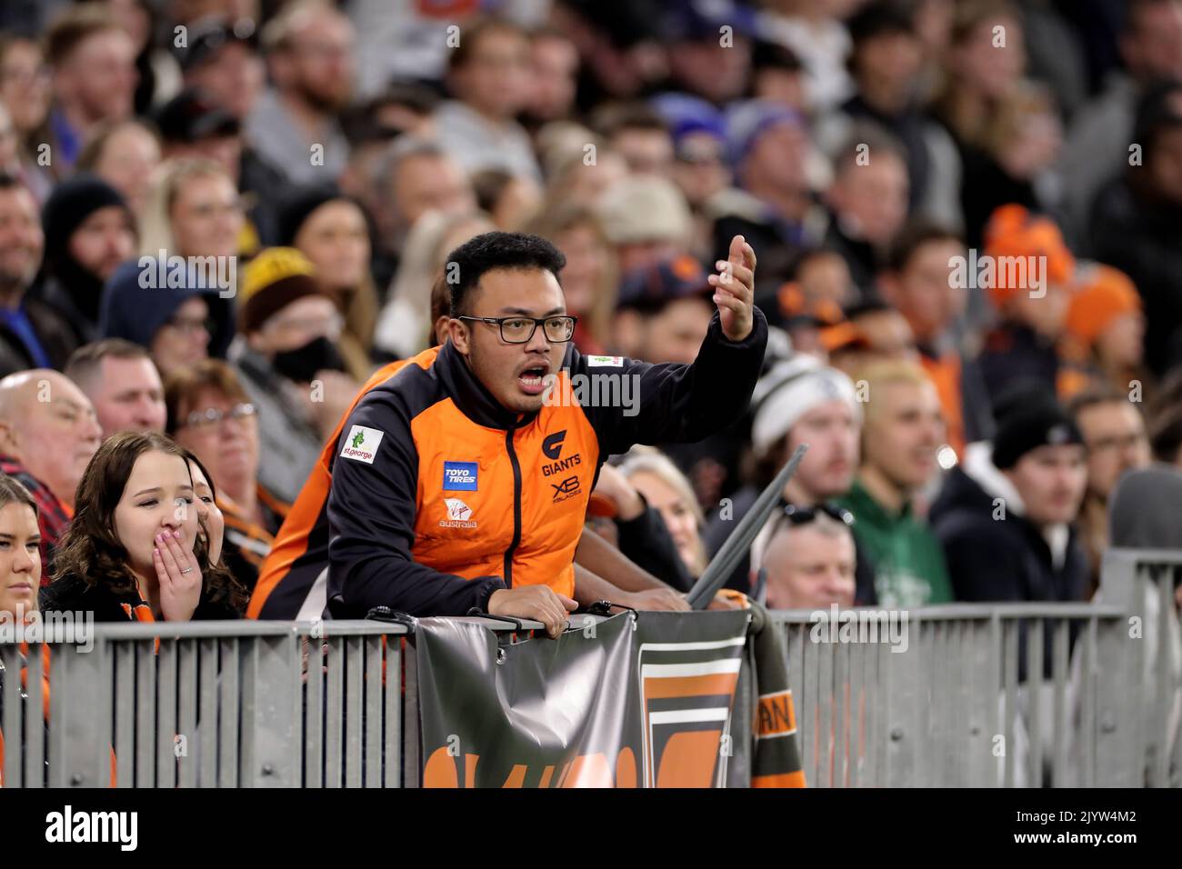 GWS fans react during the second Semi-Final AFL match between the ...