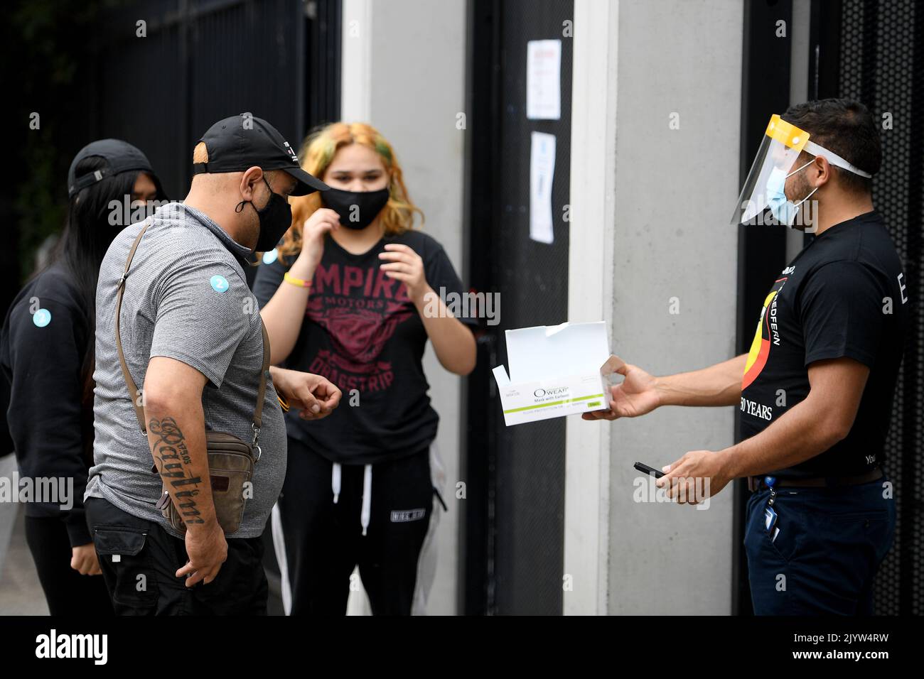 Volunteers are seen at a pop-up vaccination clinic at the National ...
